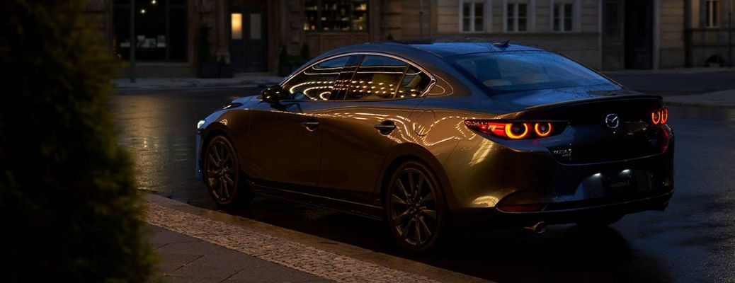 What are the Engine Specs and Safety Features of the 2024 Mazda3 Sedan?