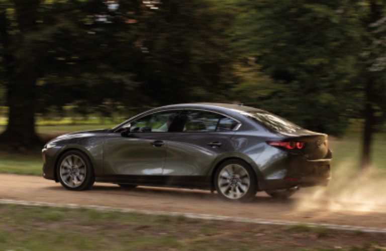 What are the Engine Specs and Safety Features of the 2024 Mazda3 Sedan?