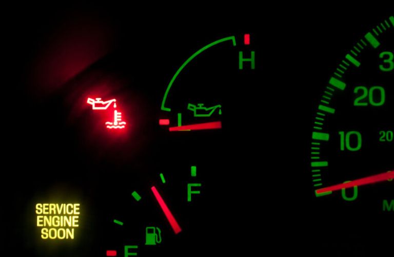 What do Nissan's dashboard warning lights mean?