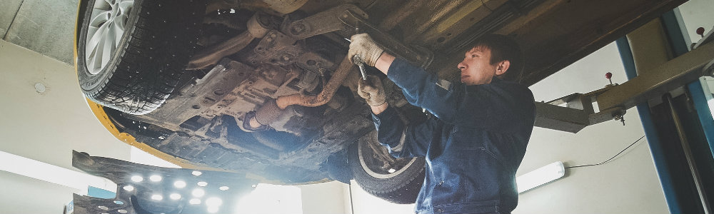 Why is there a knocking sound coming from my vehicle's suspension?