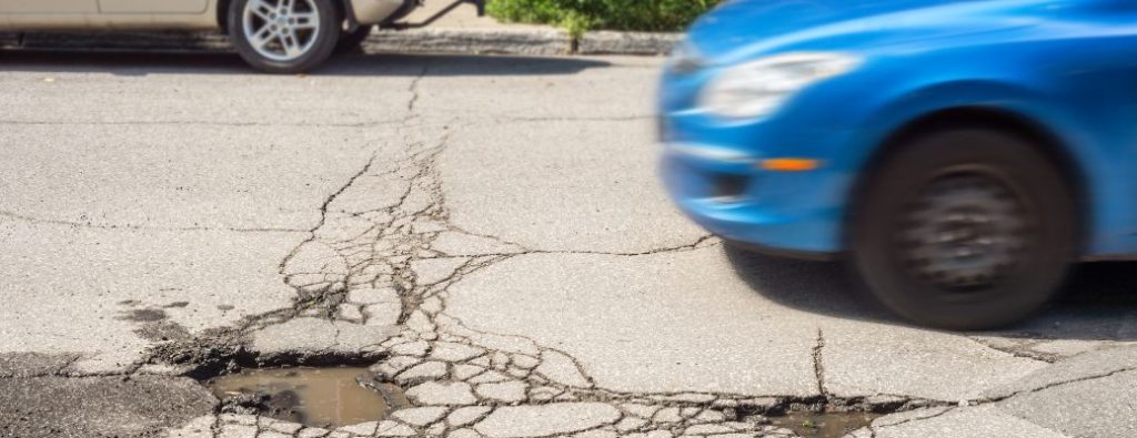 The Best Ways to Avoid Potholes to Protect Your Used Vehicle